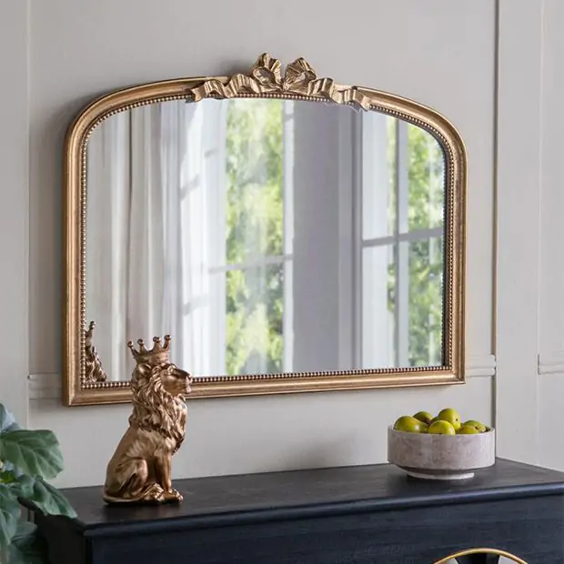 fancy bow oval mirror