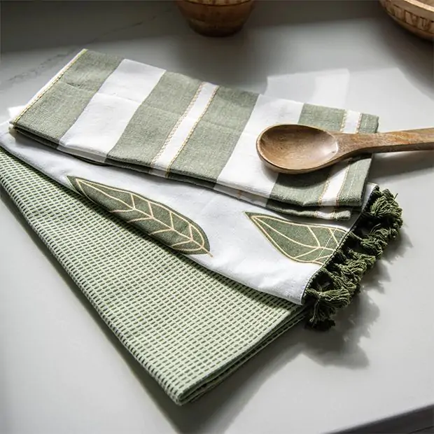 green patterned towels