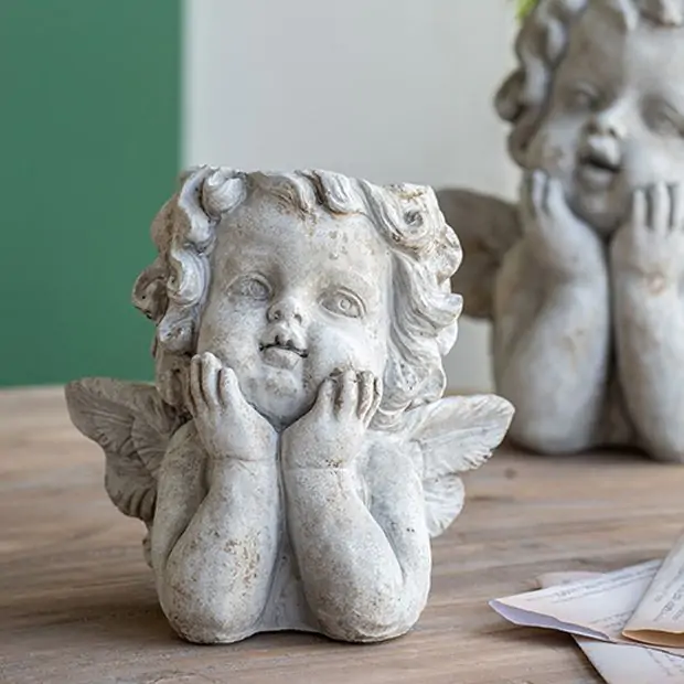 cherub cement statues